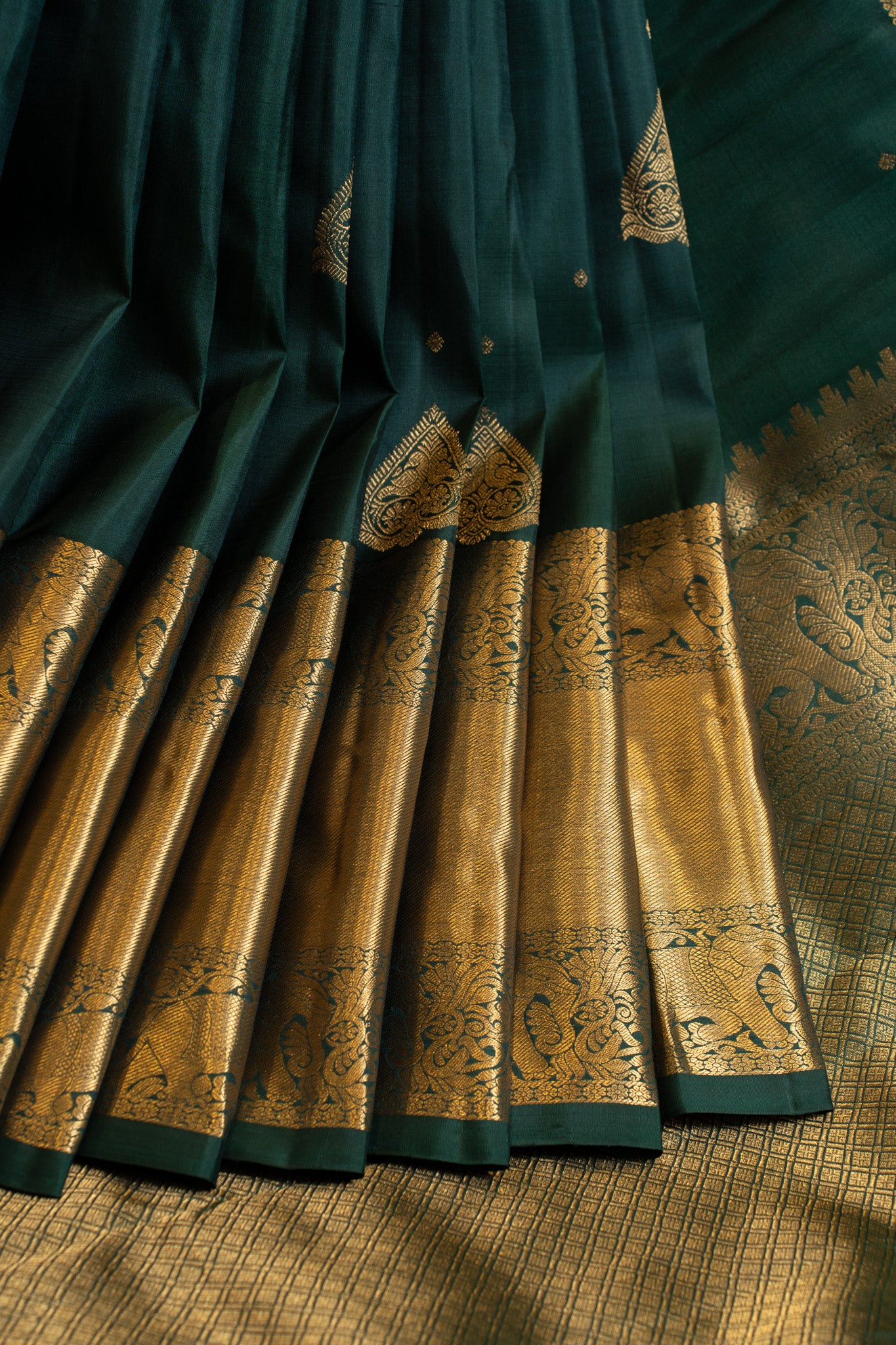 Bottle green thilakam motifs pure Kanchipuram silk saree | Clio Silks